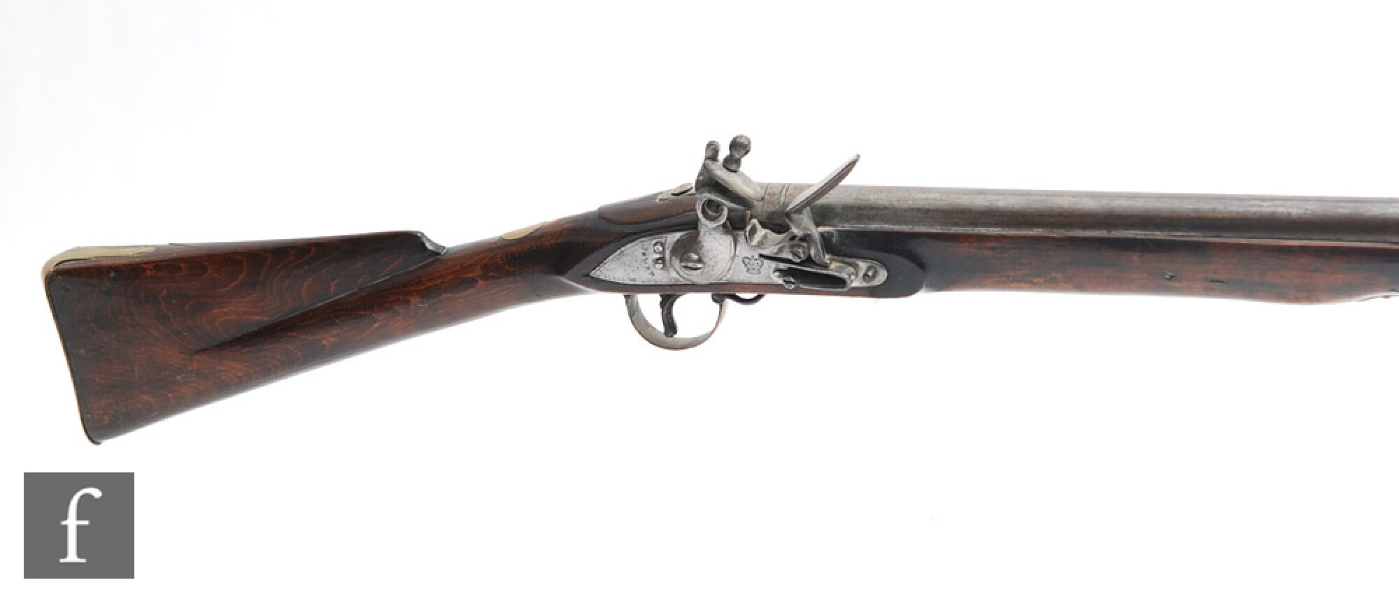 A 19th Century flintlock musket, the lock with tower mark and crown ...