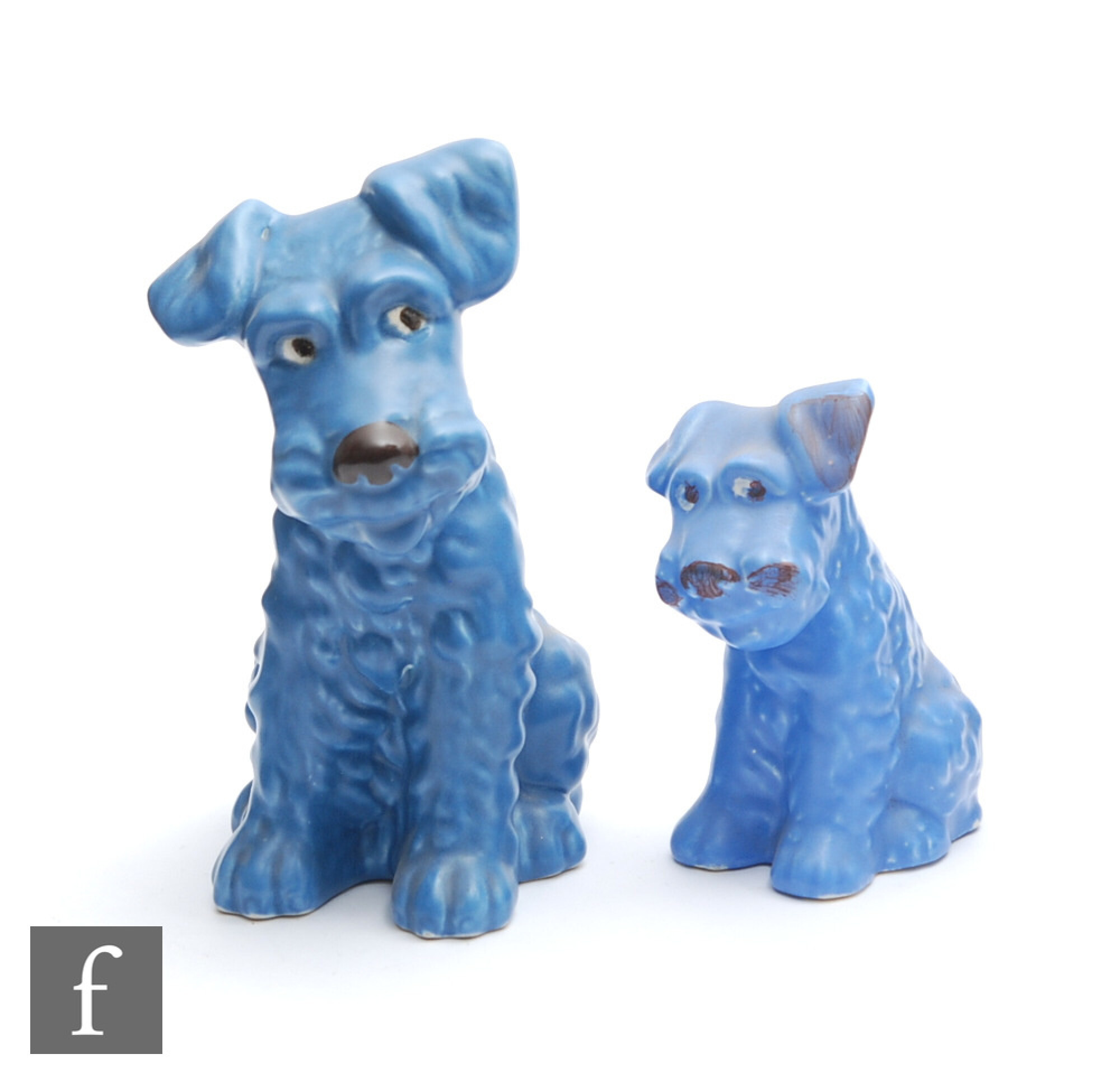 Two 1930s Sylvac graduated dogs glazed in blue, impressed marks. | Barnebys